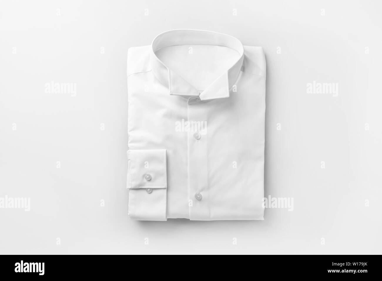 Shirt after dry-cleaning on light background Stock Photo - Alamy