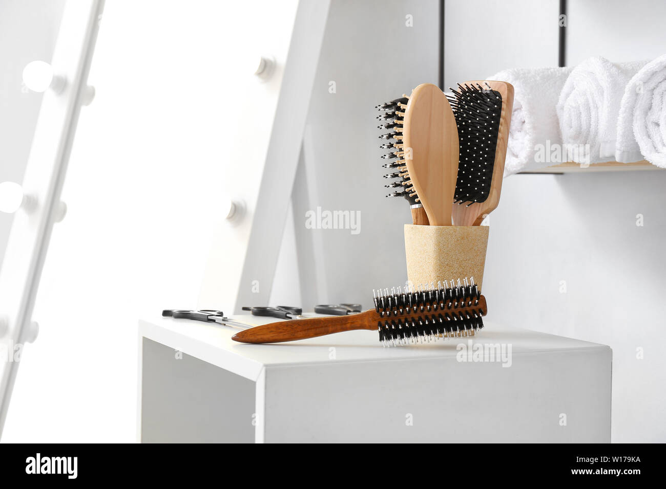 Stand with hairdresser tools in beauty salon Stock Photo - Alamy