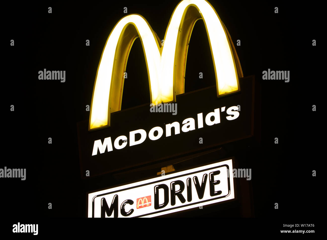 Lodz, Poland, Jan 2018 yellow McDonald's sign, night, clouds in ...