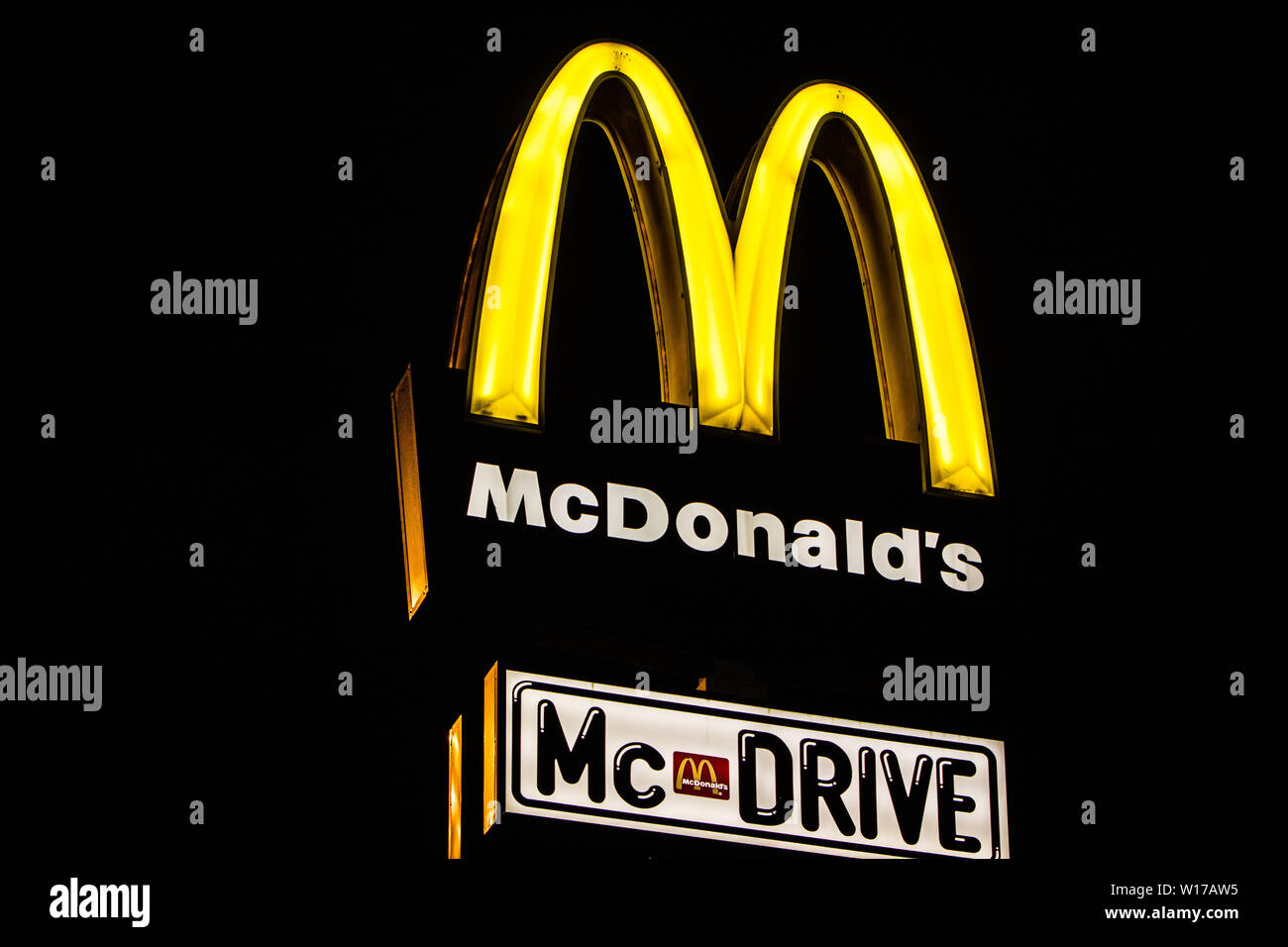 Lodz, Poland, Jan 2018 yellow McDonald's sign, night, clouds in ...