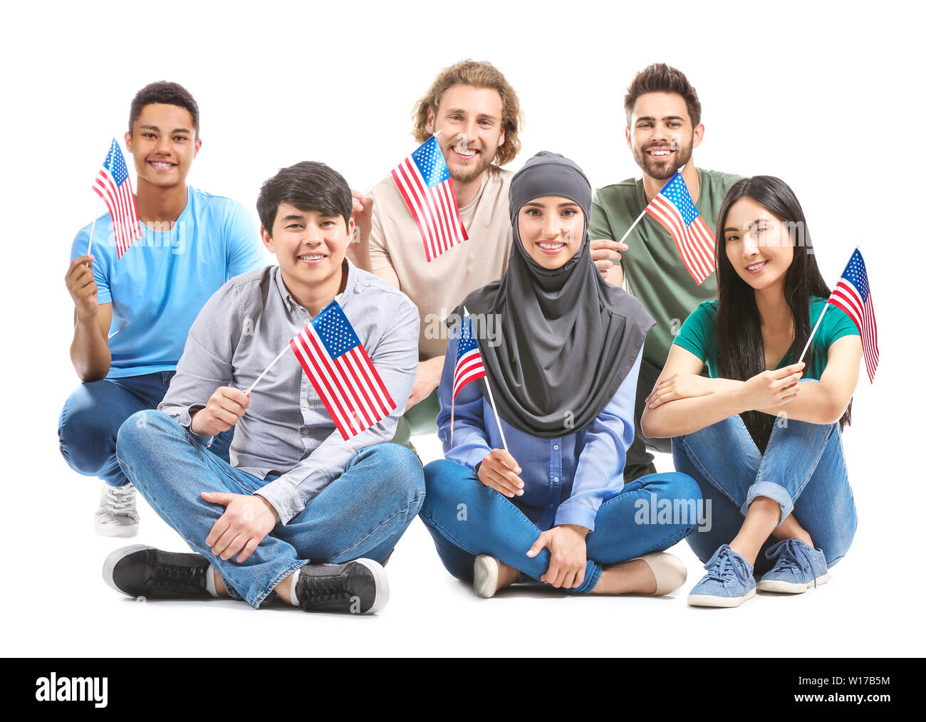 Group of students with USA flags on white background Stock Photo - Alamy