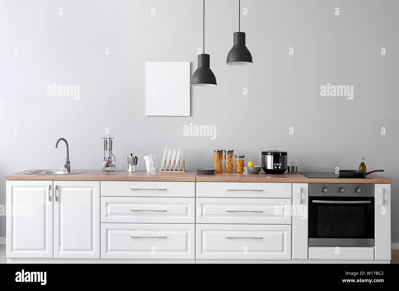 Interior of kitchen with modern oven Stock Photo - Alamy