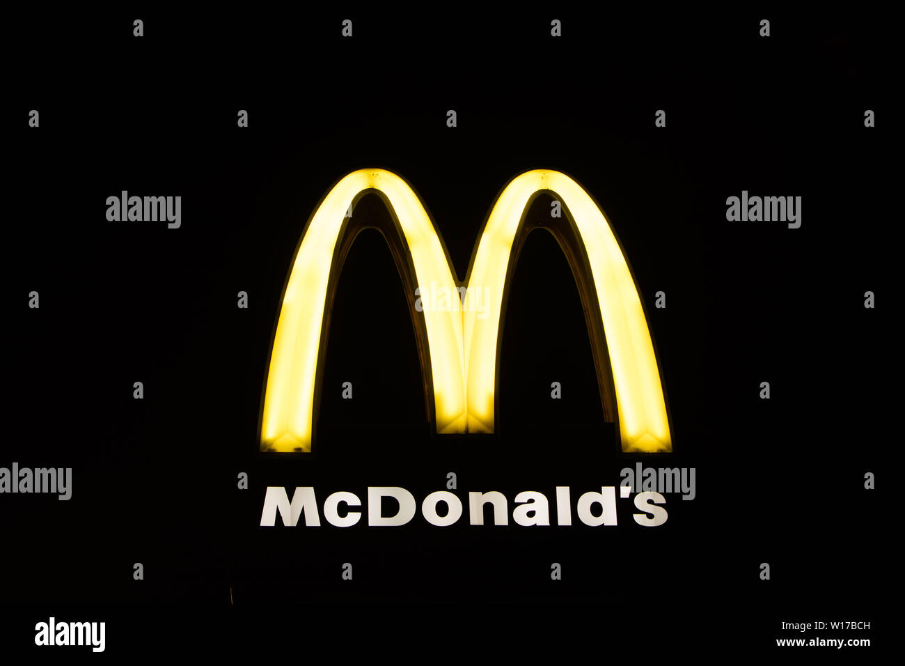 Lodz, Poland, Jan 2018 yellow McDonald's sign, night, clouds in ...