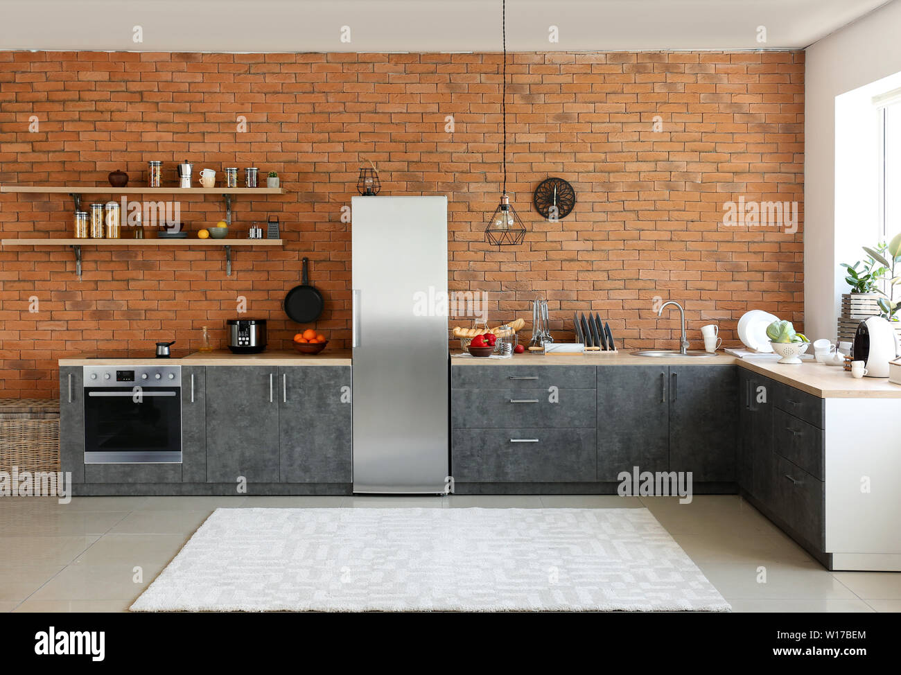 Interior of modern comfortable kitchen Stock Photo - Alamy