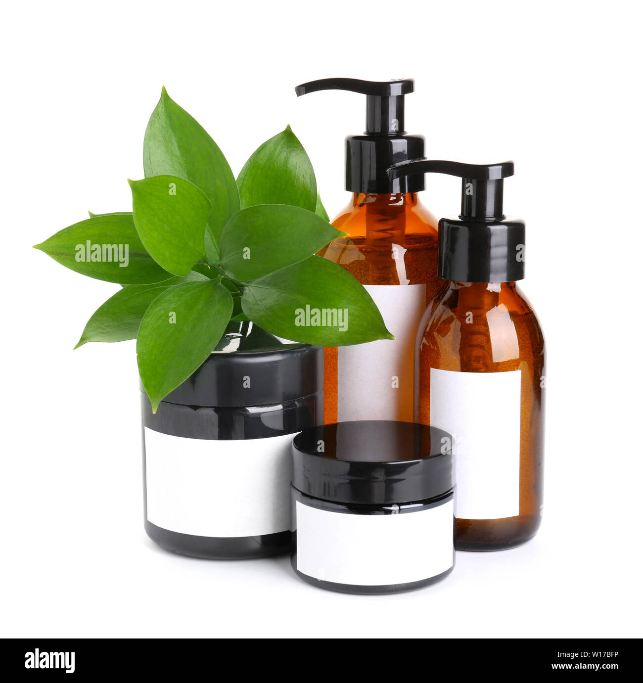 Different shampoo on white background Stock Photo - Alamy