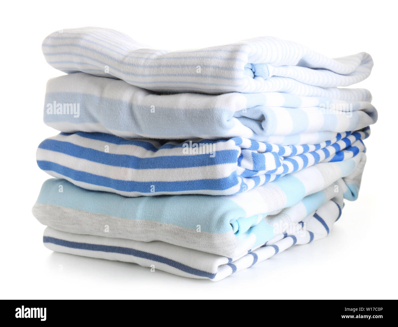 Stack of modern clothes on white background Stock Photo - Alamy