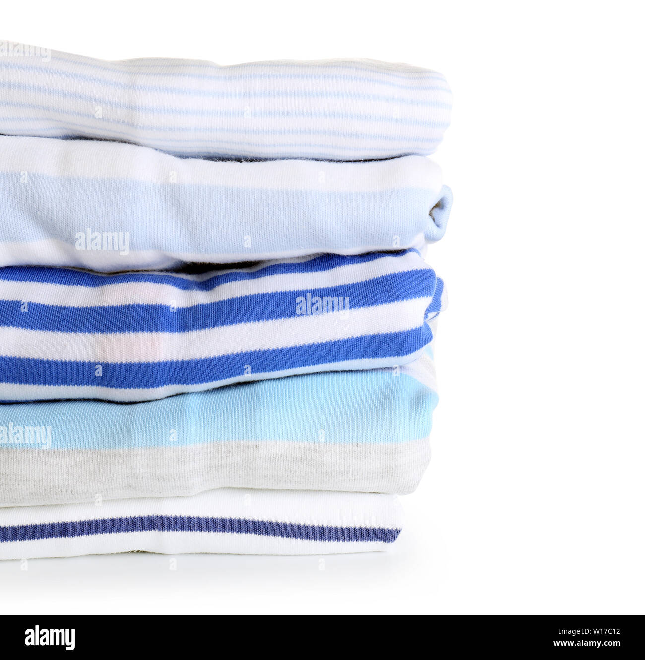 Stack of modern clothes on white background Stock Photo - Alamy