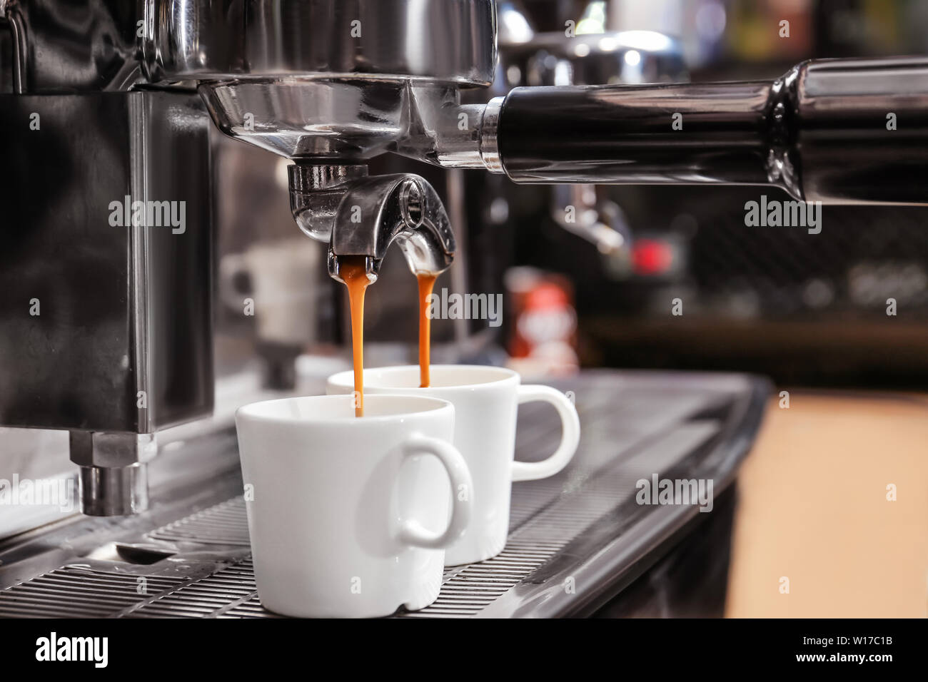 Modern coffee machine making coffee Stock Photo - Alamy