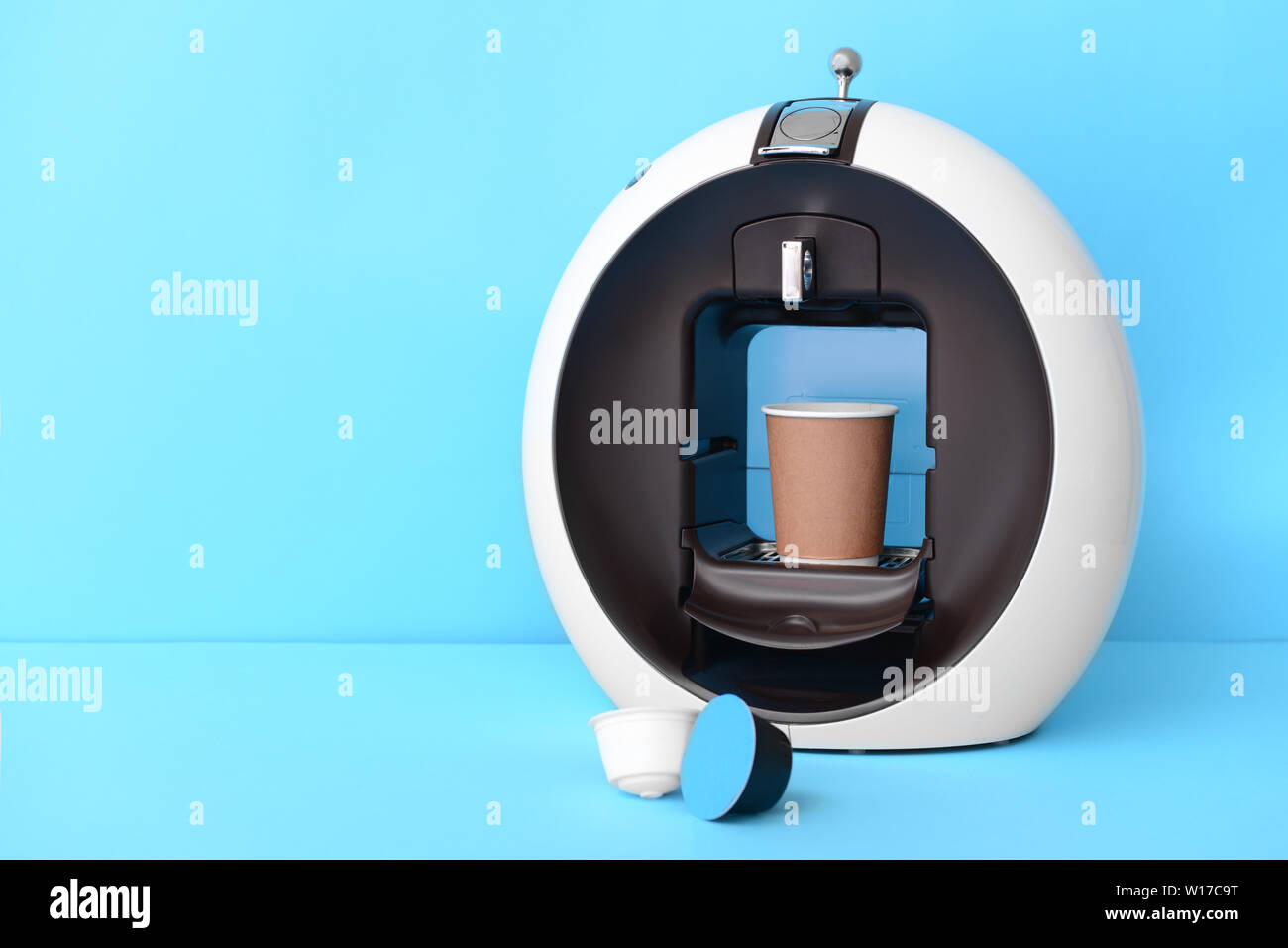 Modern coffee machine on color background Stock Photo - Alamy