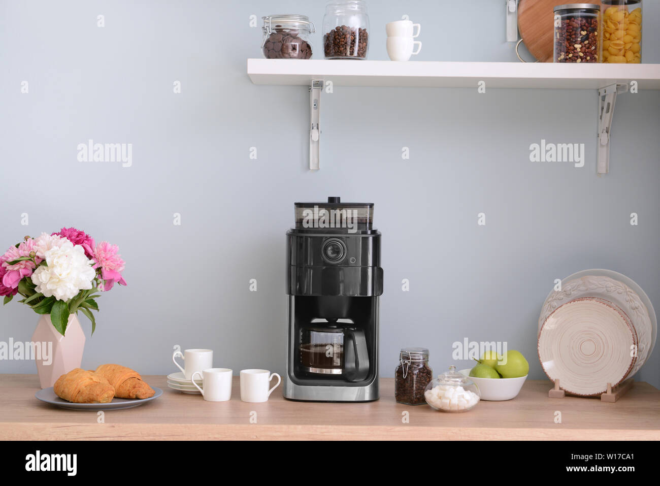 Modern coffee machine in kitchen Stock Photo - Alamy