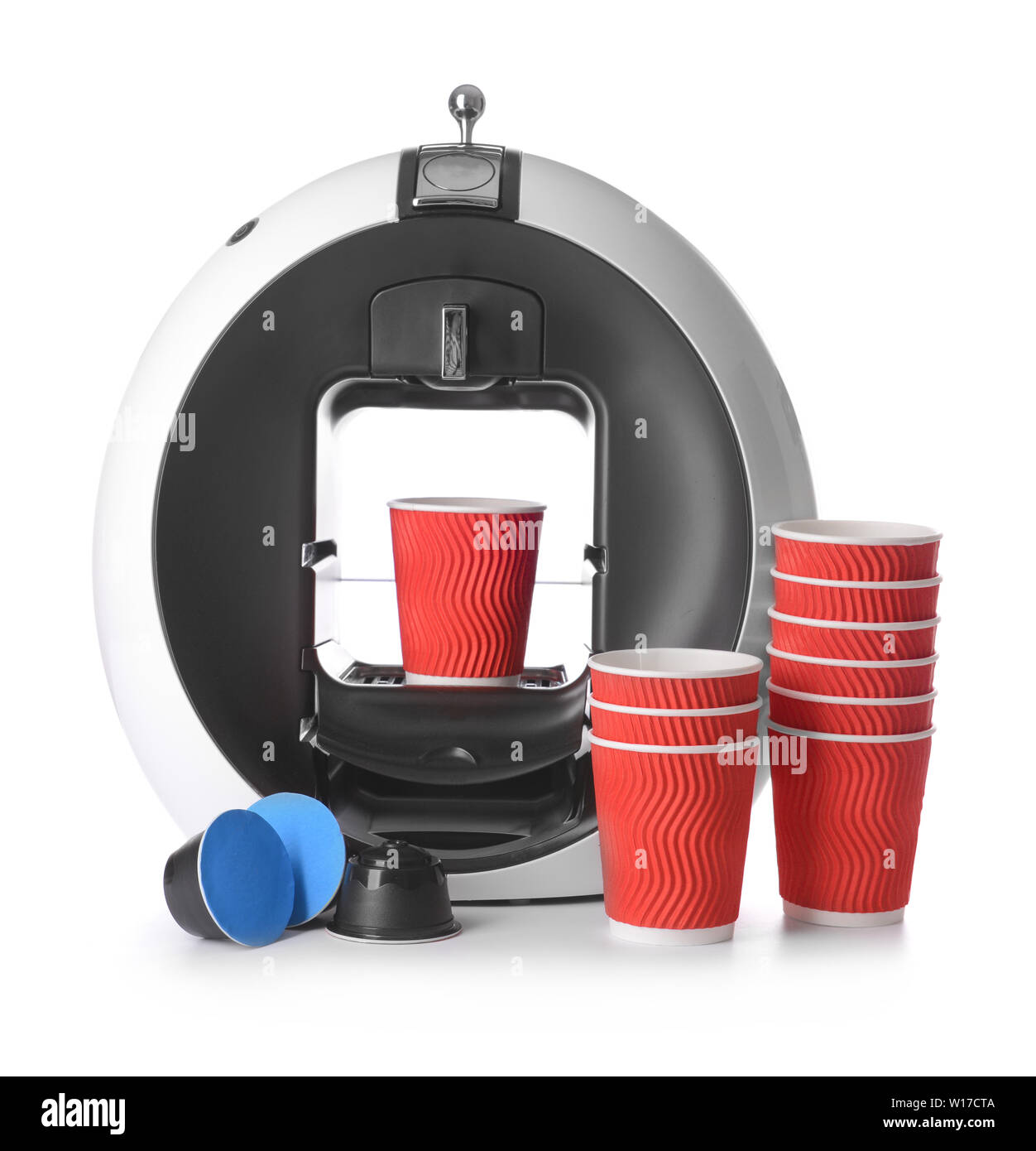 Modern coffee machine with cups and capsules on white background Stock ...