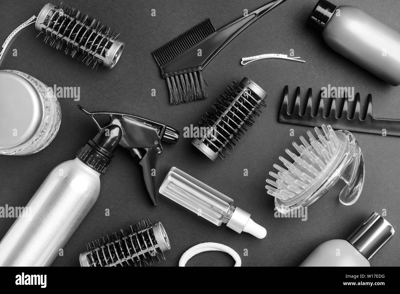 Set of hairdresser tools and accessories on dark background Stock Photo ...