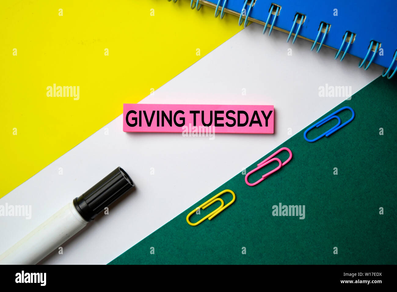Giving Tuesday text on sticky notes with office desk concept Stock ...