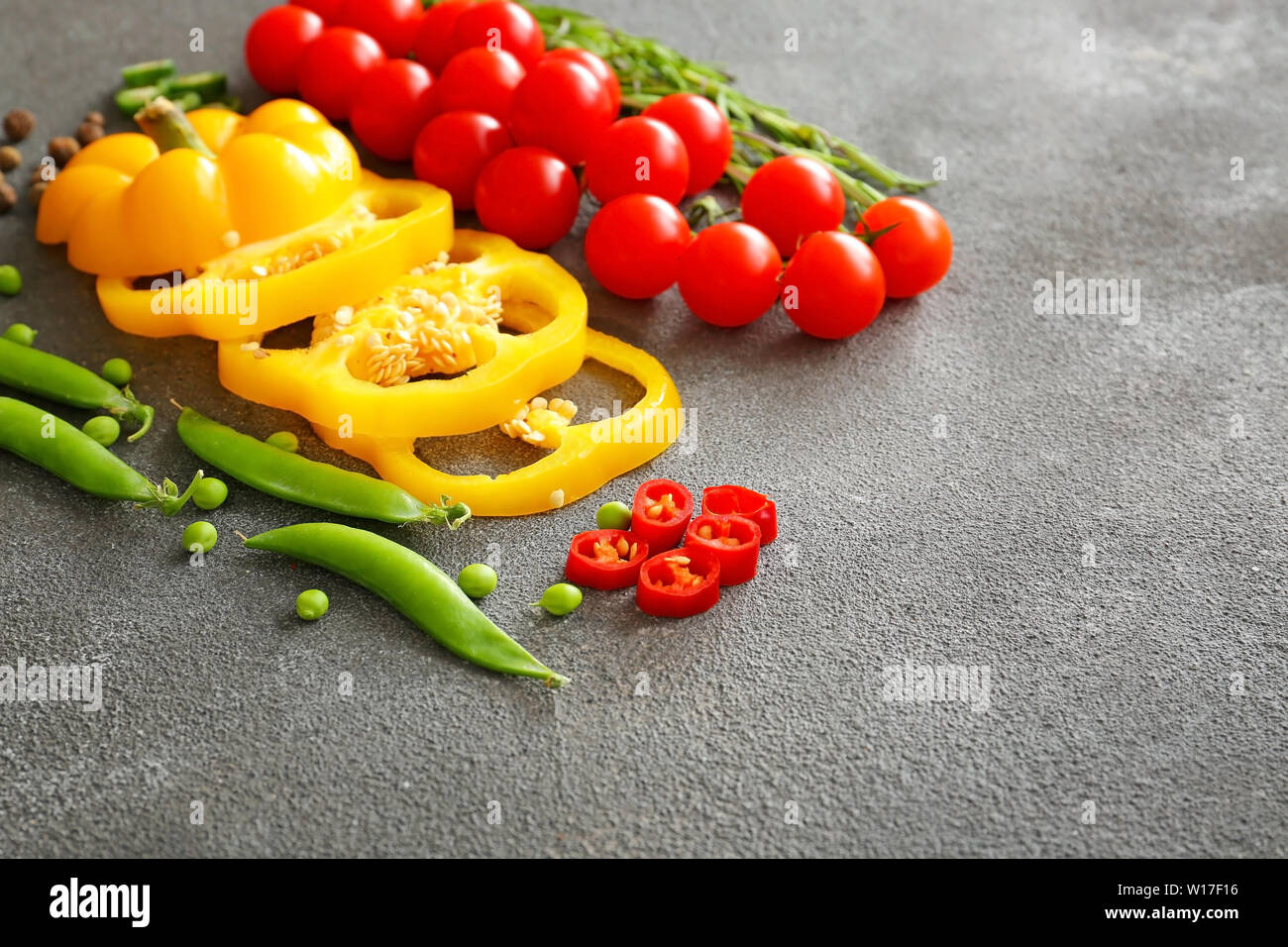 Fresh vegetables on grey background Stock Photo - Alamy