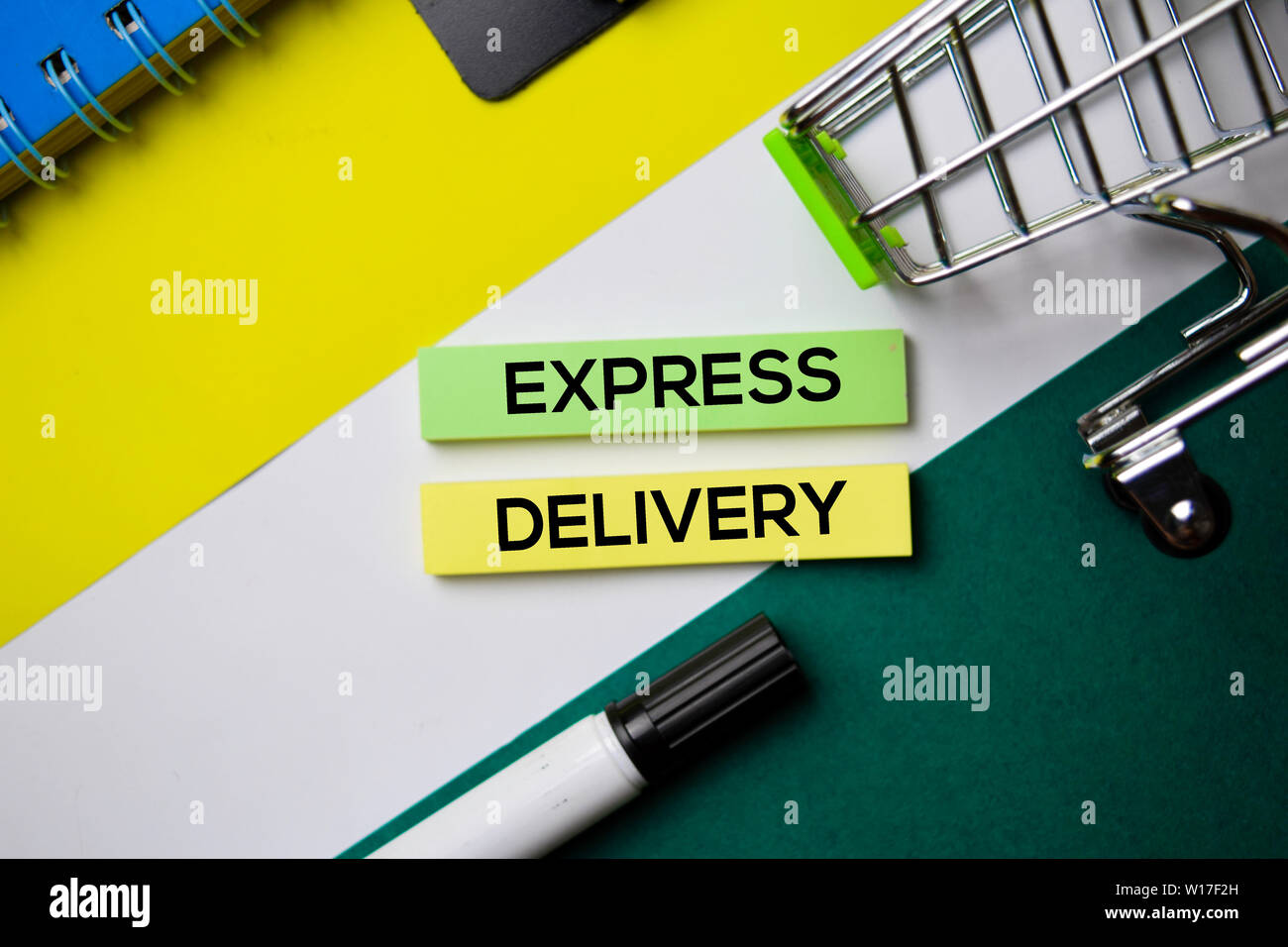 Express Delivery text on sticky notes with office desk concept Stock ...