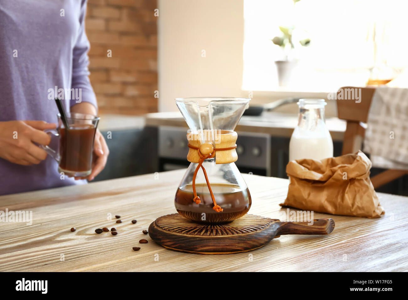 People making coffee in clear hi-res stock photography and images - Alamy