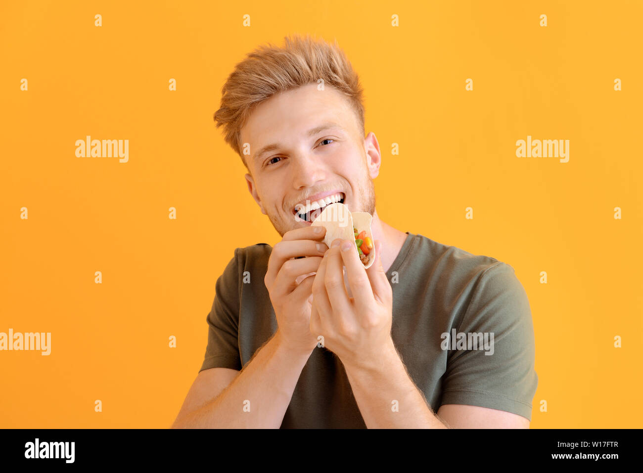 Man eating taco hi-res stock photography and images - Alamy