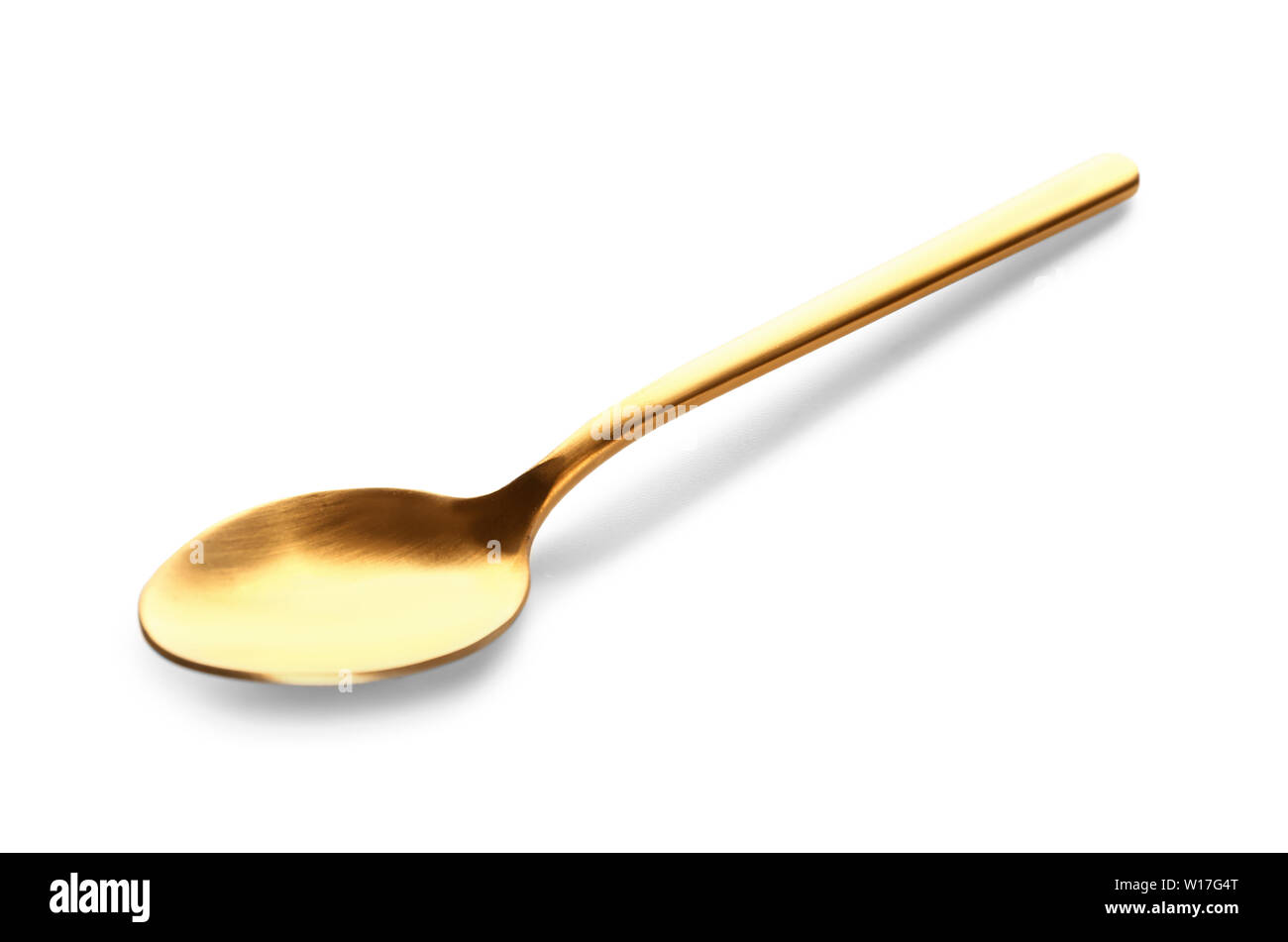 Cutlery golden spoon Cut Out Stock Images & Pictures - Alamy