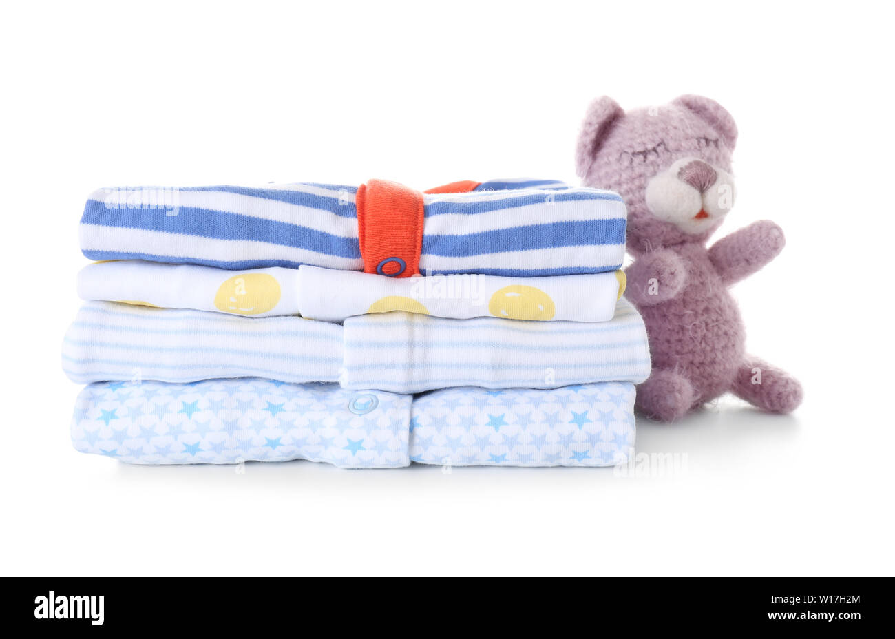 Stack of baby clothes on white background Stock Photo - Alamy
