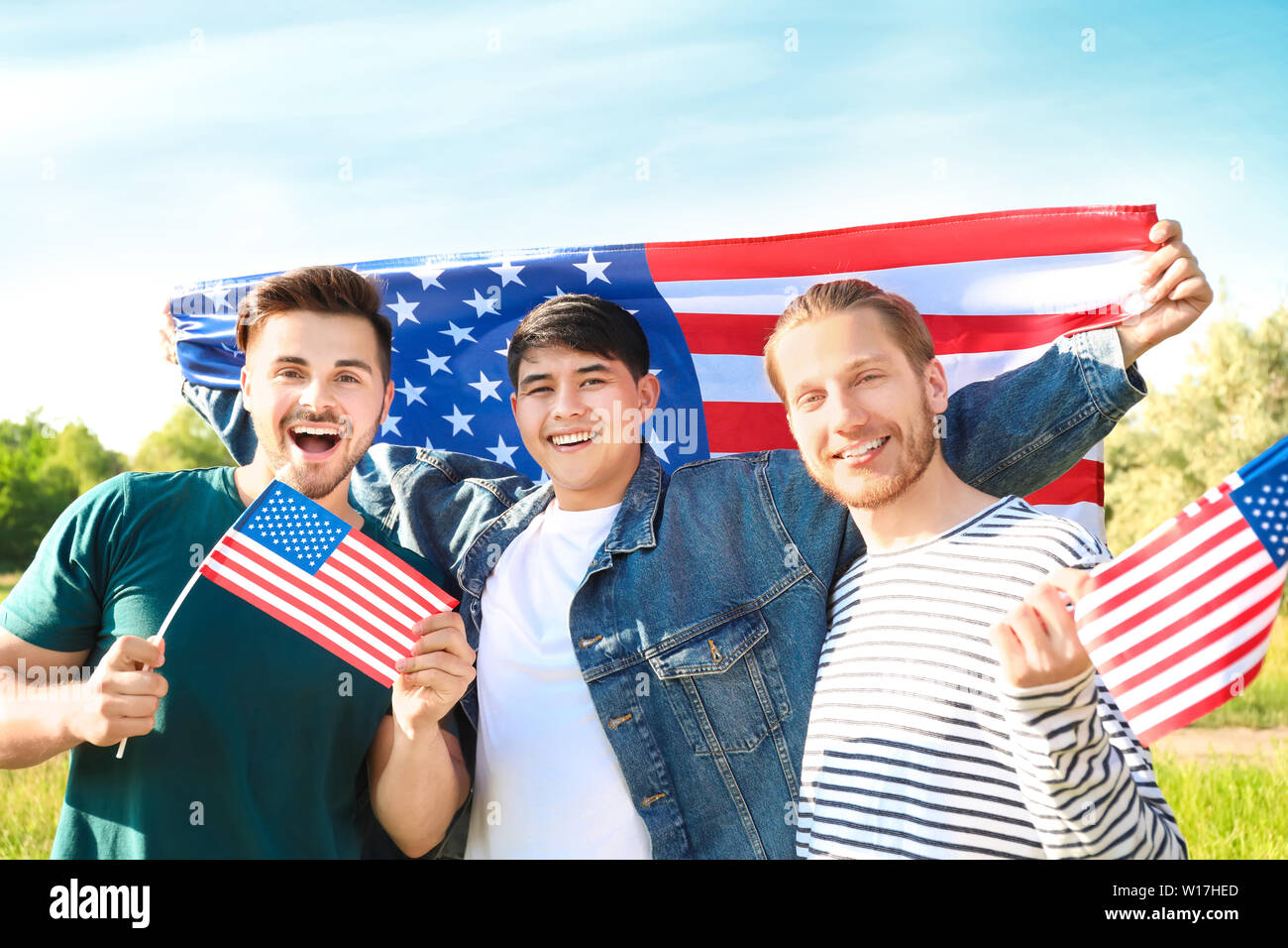 Young adult friends greeting usa hi-res stock photography and images ...