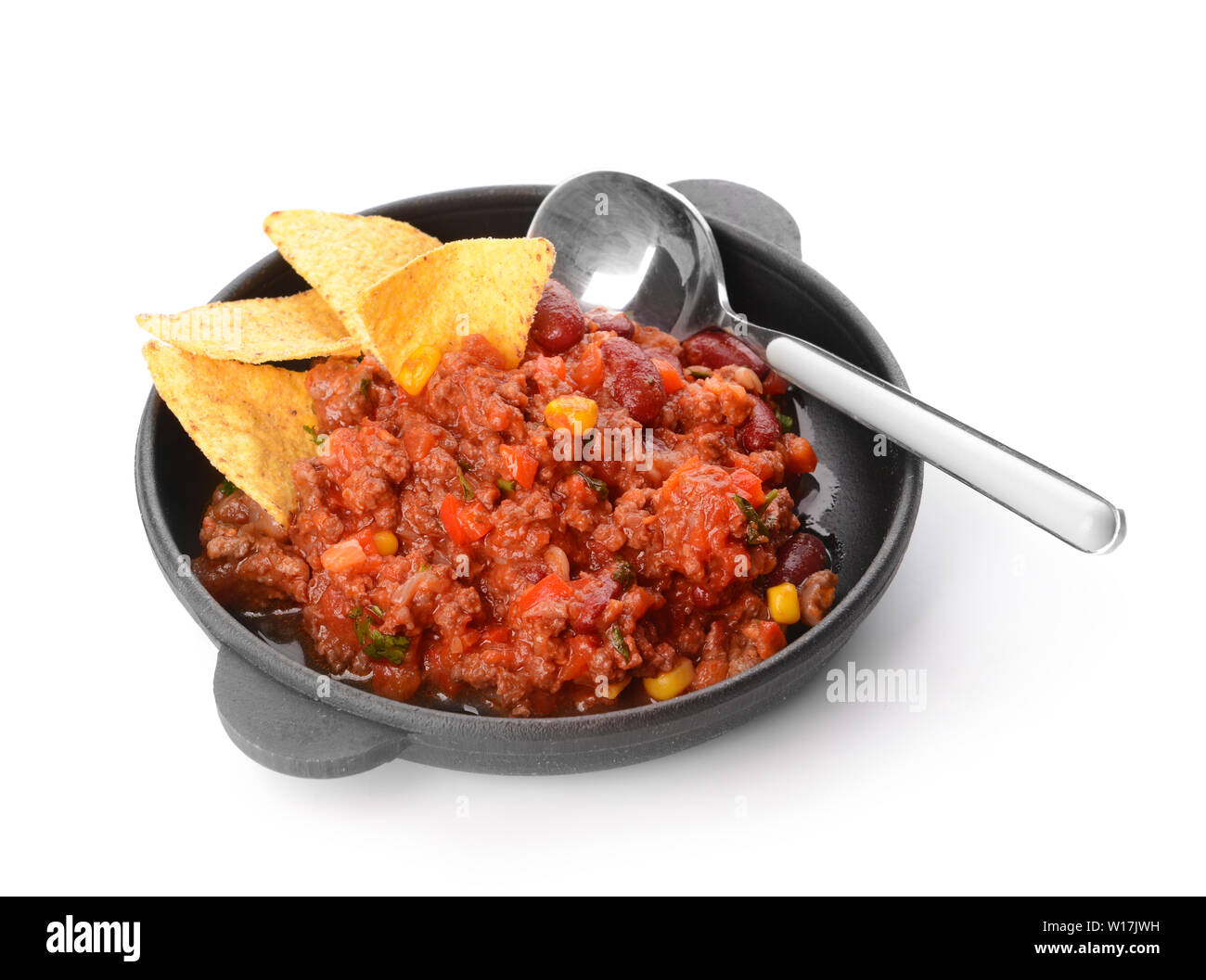 Frying pan with tasty chili con carne on white background Stock Photo ...