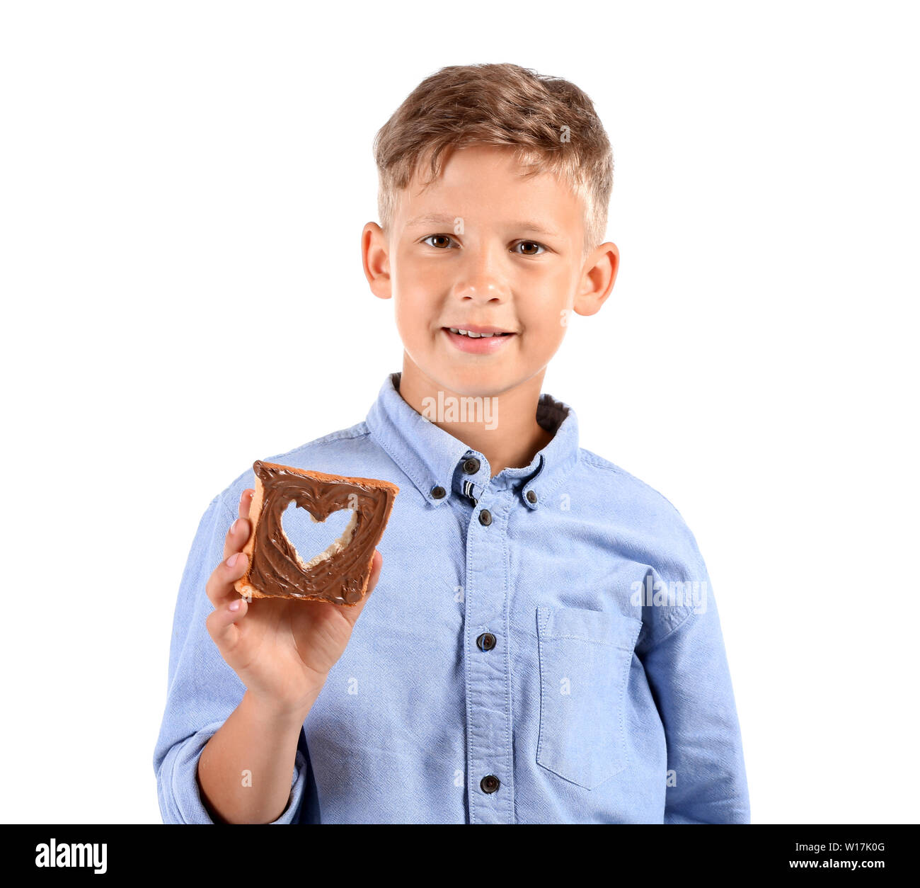 Funny little boy with tasty toast on white background Stock Photo - Alamy