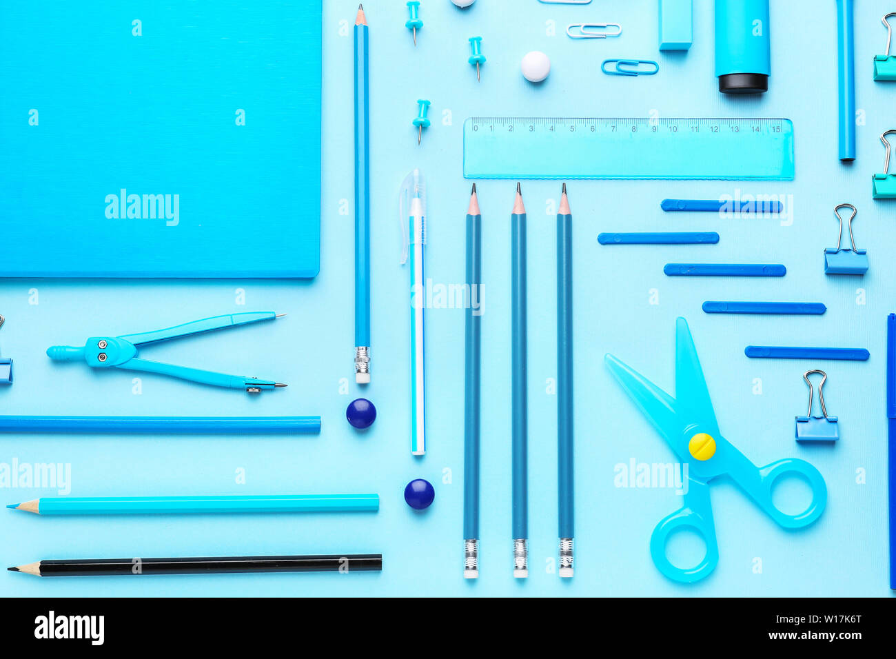 Set of school supplies on color background Stock Photo - Alamy