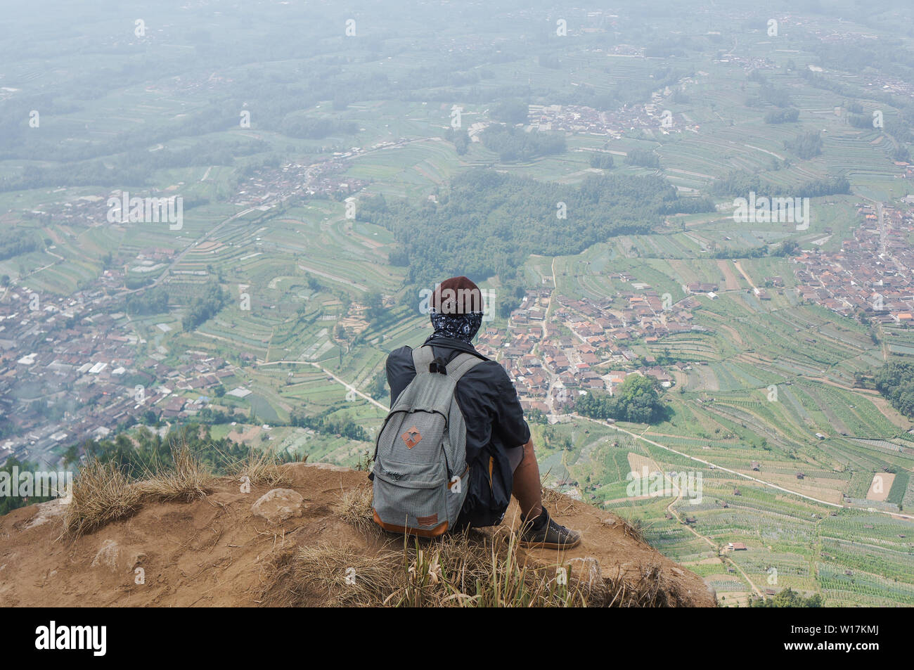 Tourist stand at the edge of a hill on Andong mountain, Indonesia Stock ...