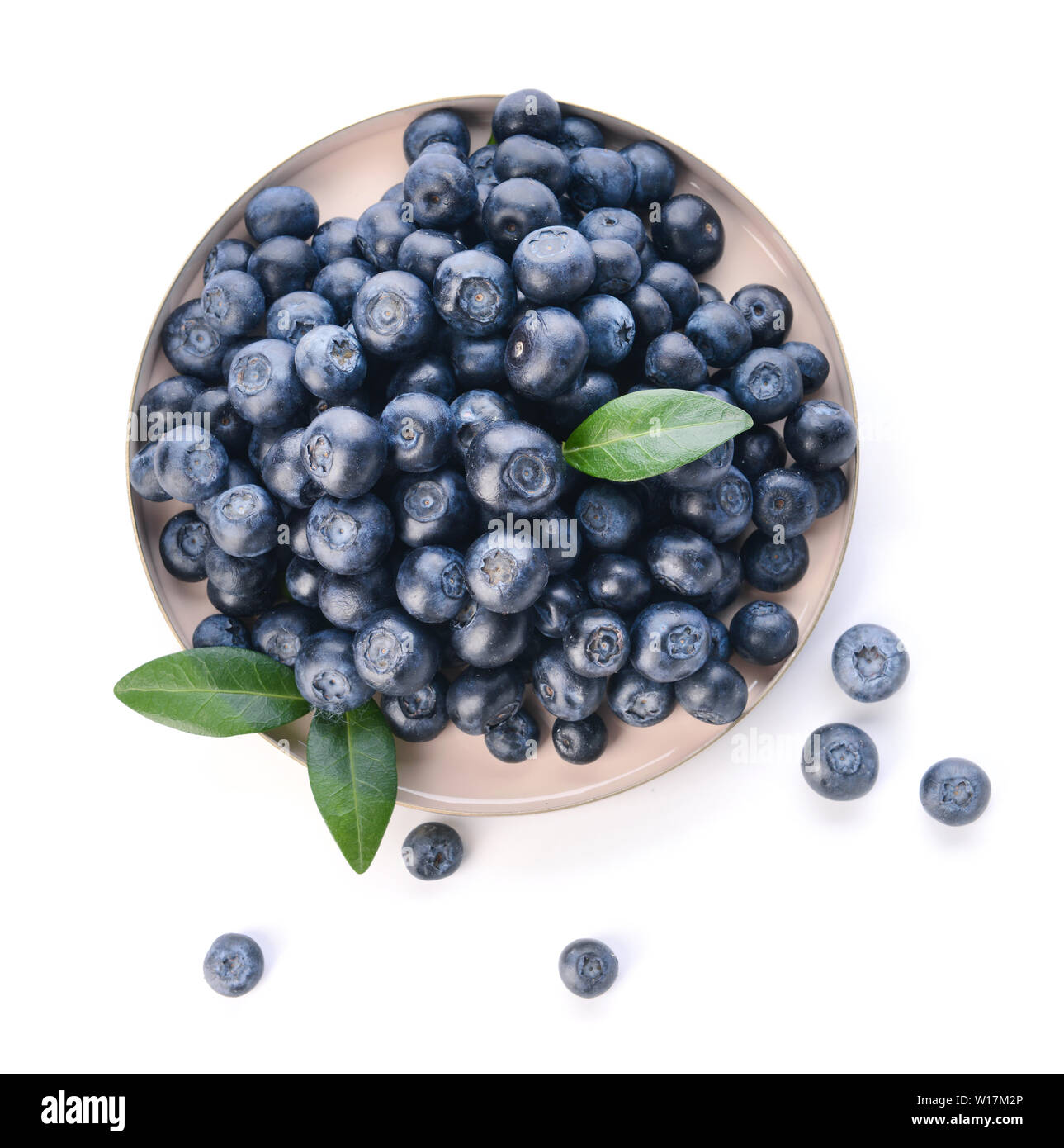Plate with ripe blueberry on white background Stock Photo - Alamy