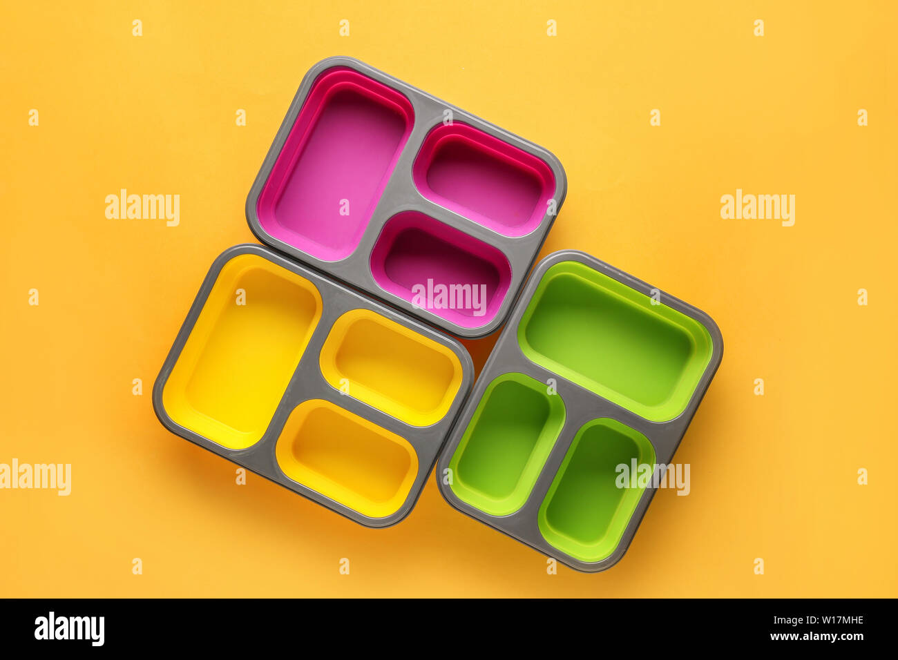 Plastic lunch boxes on color background Stock Photo - Alamy