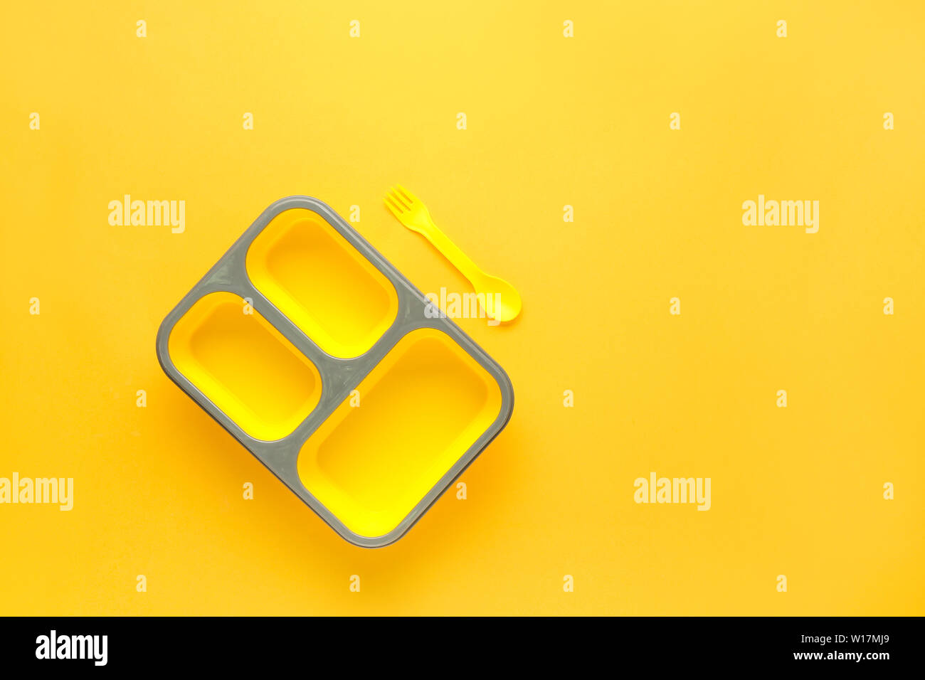 Plastic lunch box on color background Stock Photo - Alamy