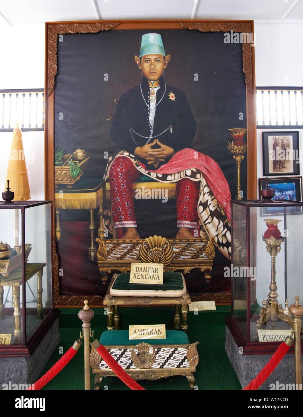 A portrait painting of and museum displays inside Keraton Yogyakarta ...