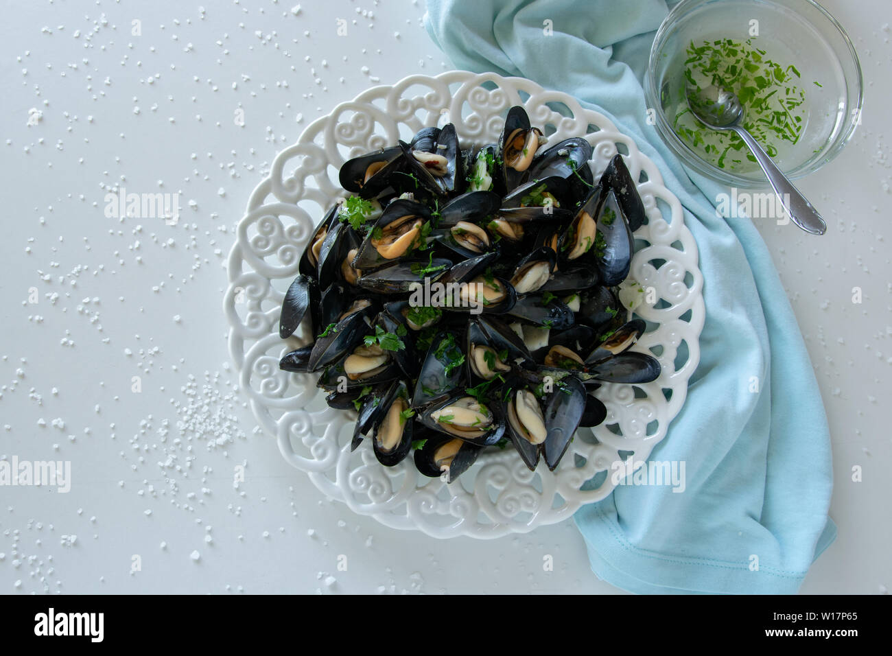 Cooked delicious black mussel, salty white background. Healthy eating ...