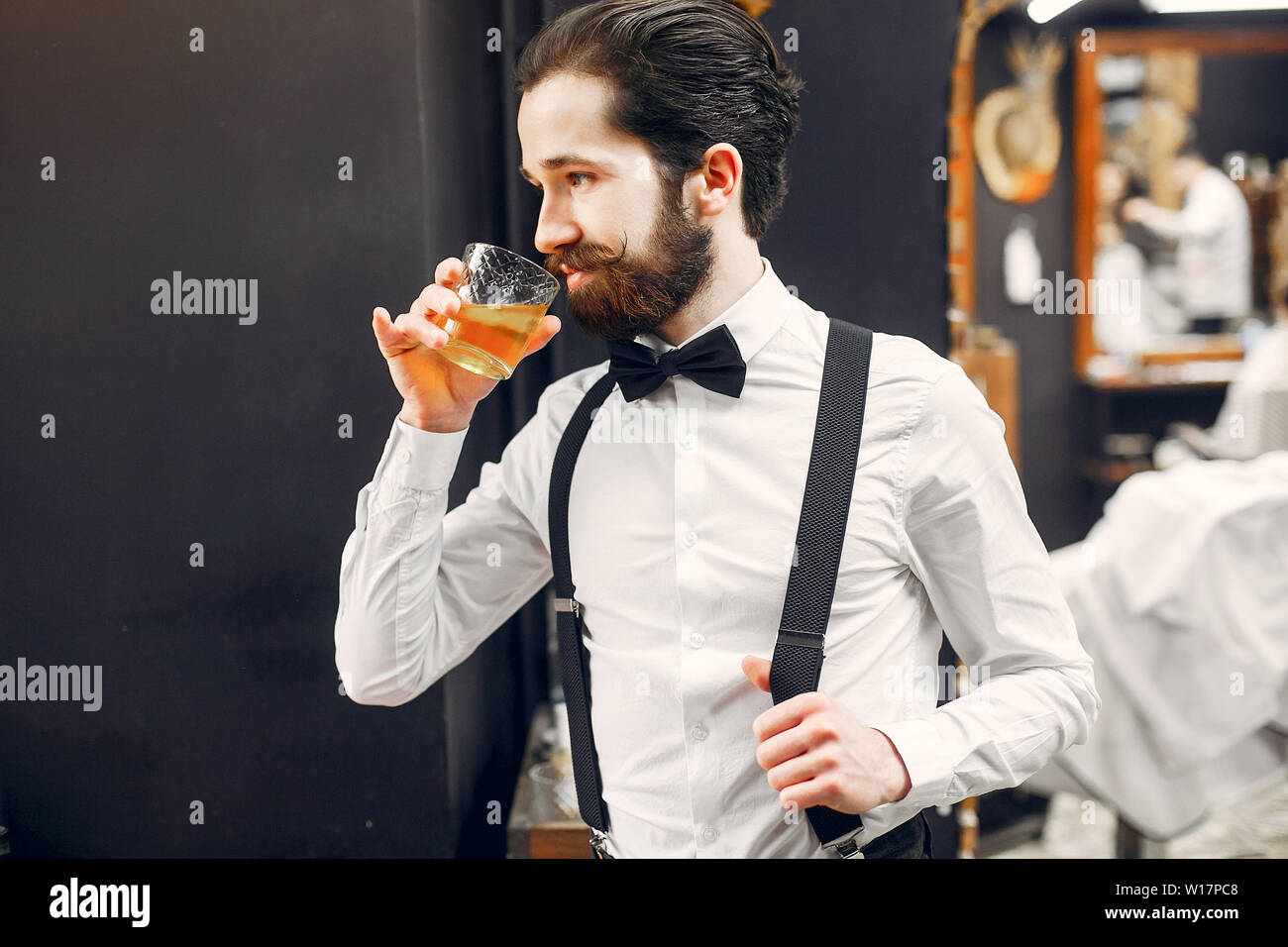 Man whiskey in barbershop hi-res stock photography and images - Alamy