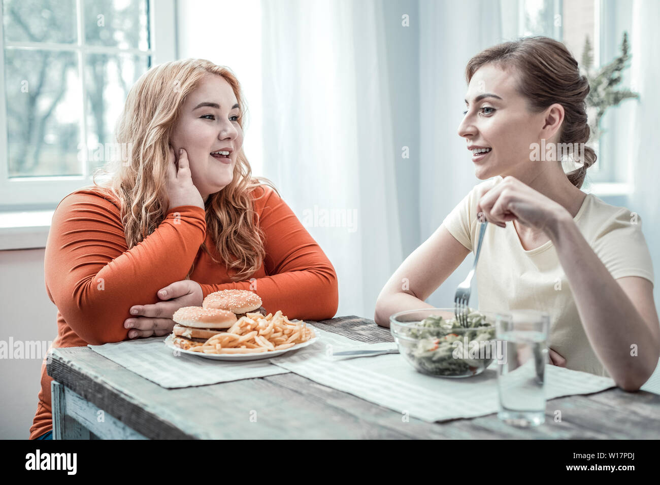 Friendly plus hi-res stock photography and images - Alamy