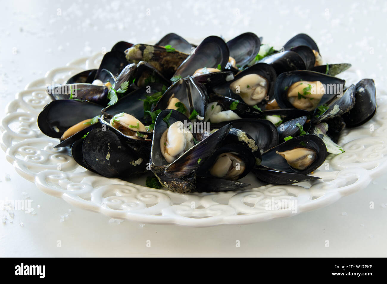 Close up view of cooked delicious black mussel. Healthy eating concept ...