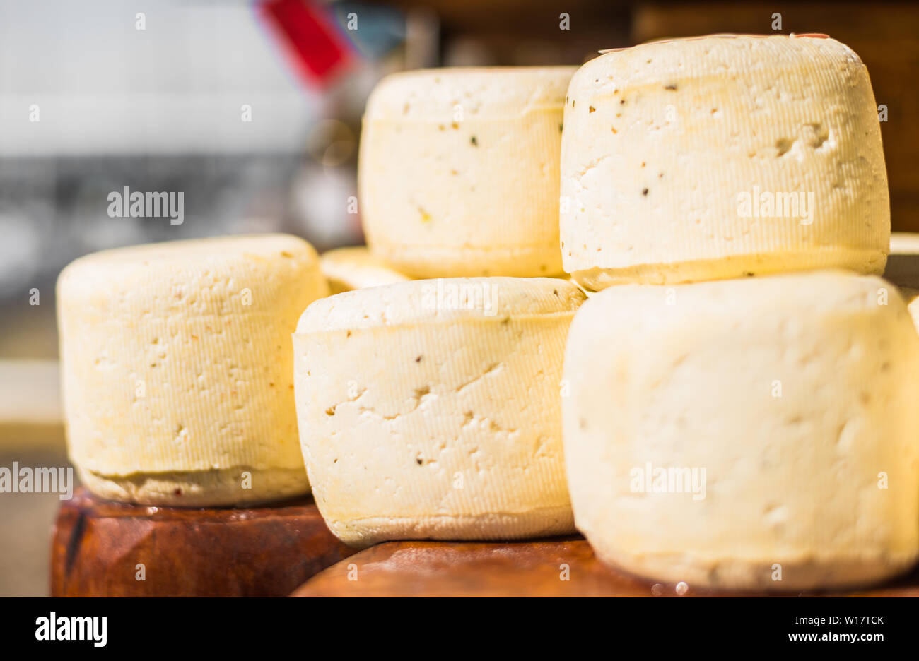 Traditional Italian cheeses on a display at a street food market Stock ...