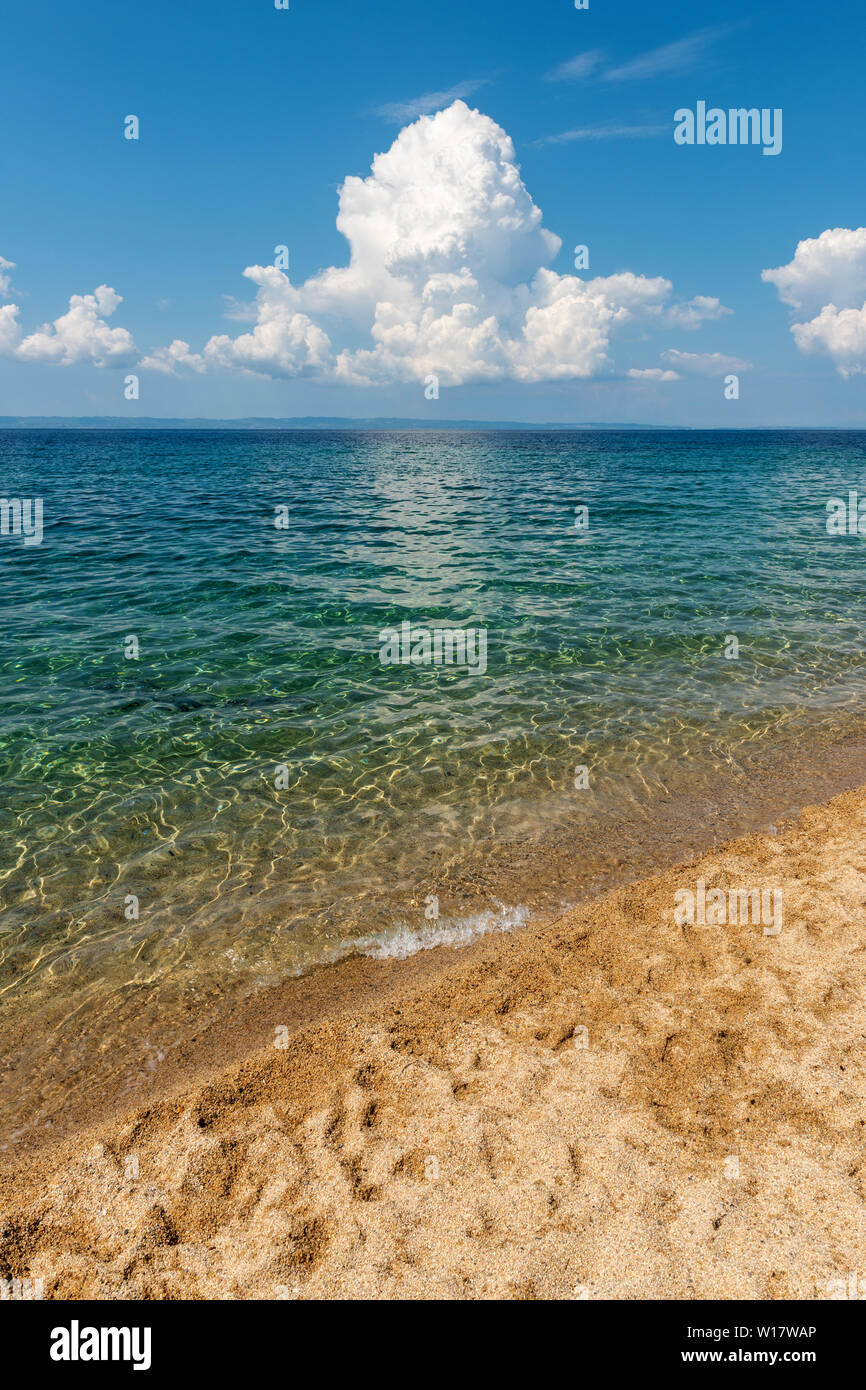 Sea sand sky concept. Sand on beach and blue summer sky, calmness and ...
