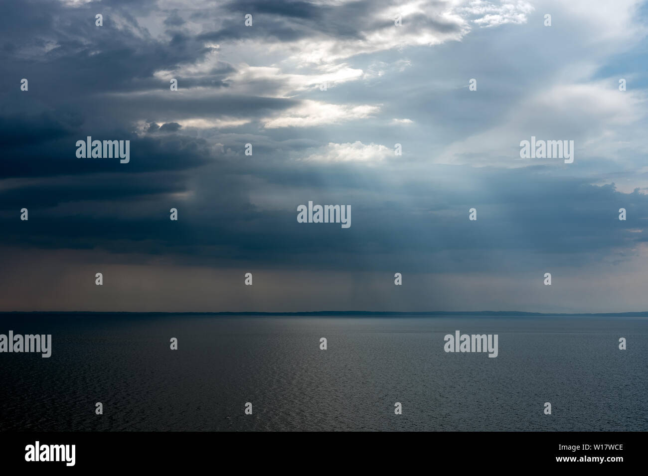 Under blue sky light clouds on beautiful summer evening hi-res stock ...