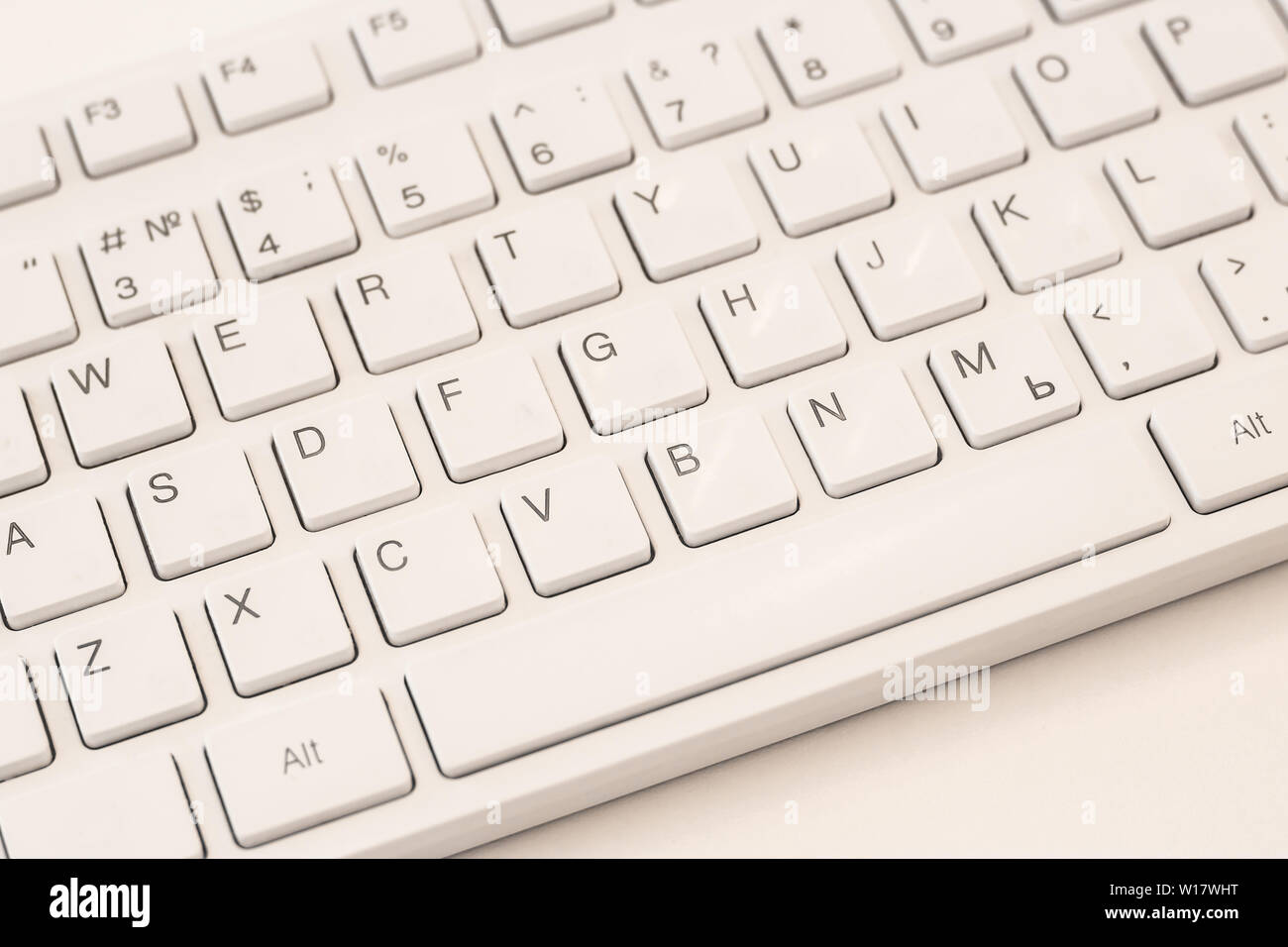 White computer keyboard on a white background, close-up view Stock ...