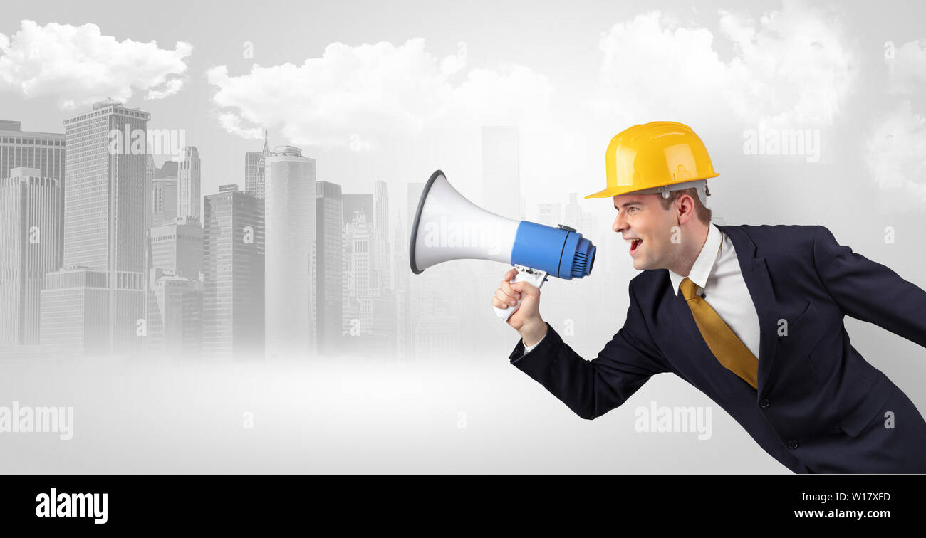 Young supervisor architect yelling to far big city panorama Stock Photo ...