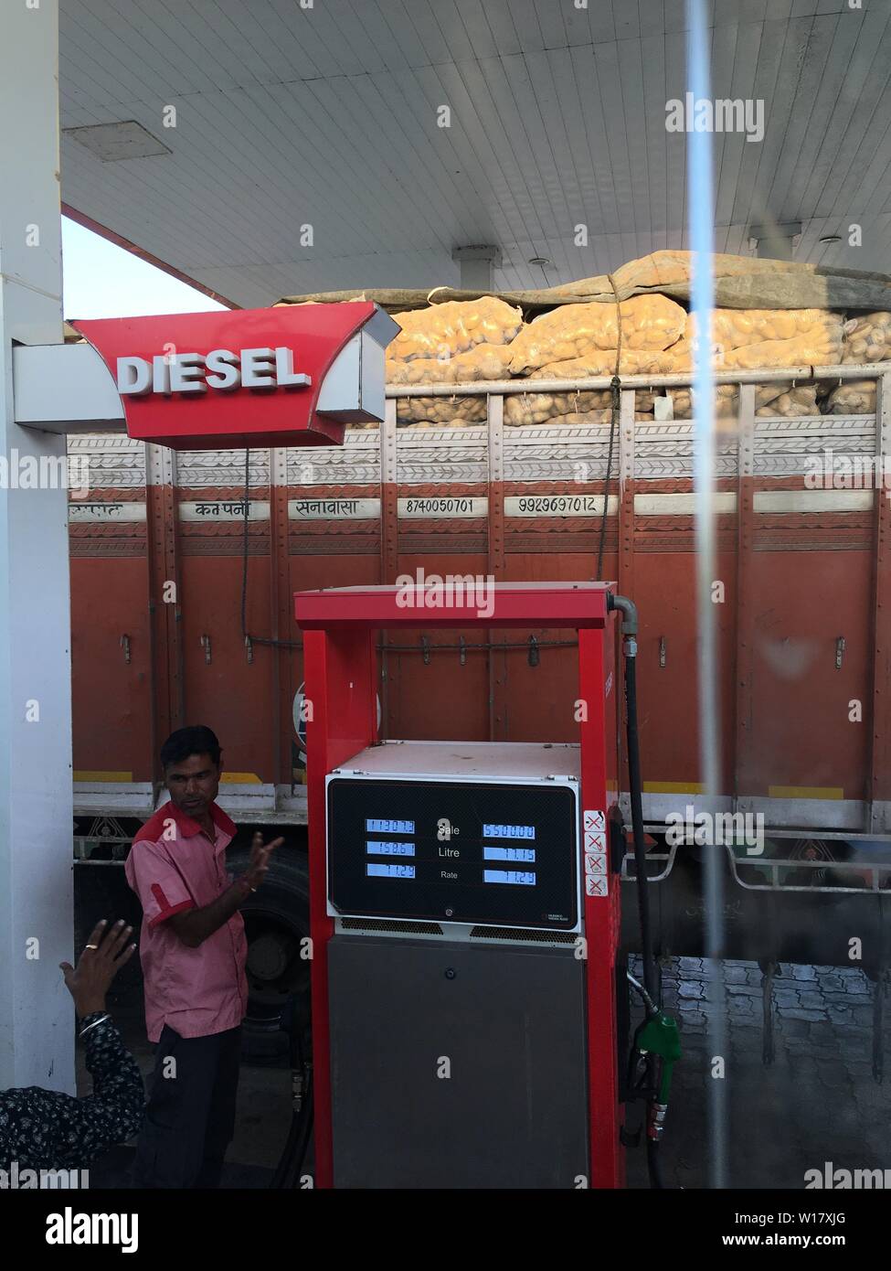 Tank attendant hi-res stock photography and images - Alamy