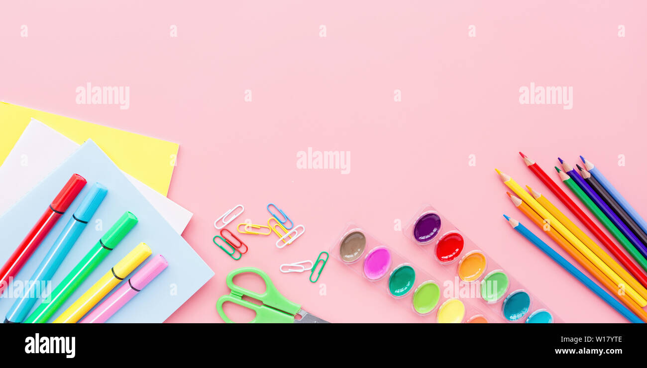 Orange back to school flat lay with bright stationery. School supplies ...