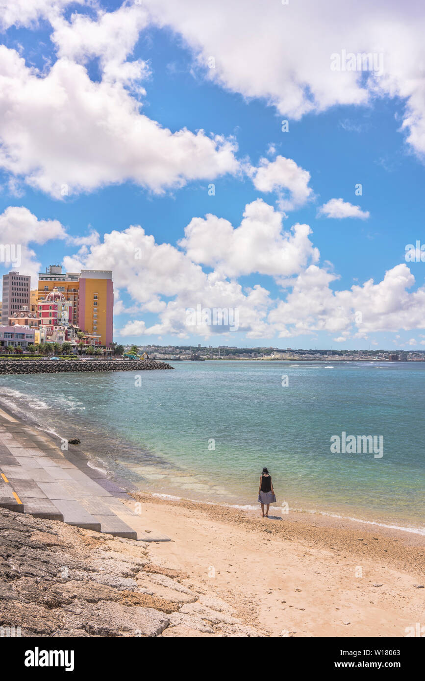 Woman from behind on the Beach in the vicinity of the American Village ...