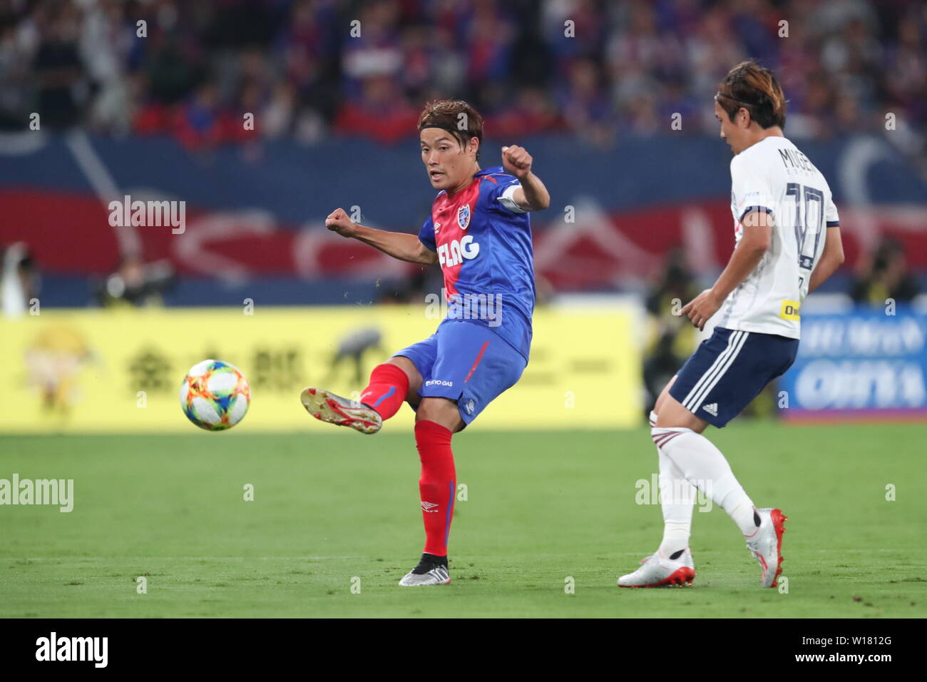 FC Tokyo's Keigo Higashi and Marinos' Jun Amano during the 2019 J1 ...