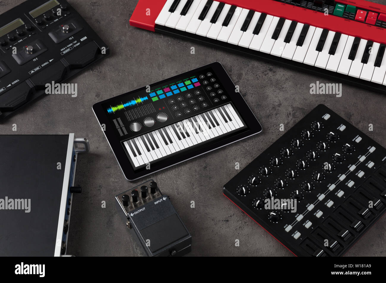 Piano synthesizer app on tablet and musical instrument concept Stock ...