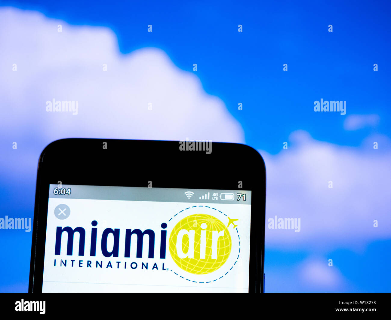In this photo illustration the Miami Air International logo is seen ...
