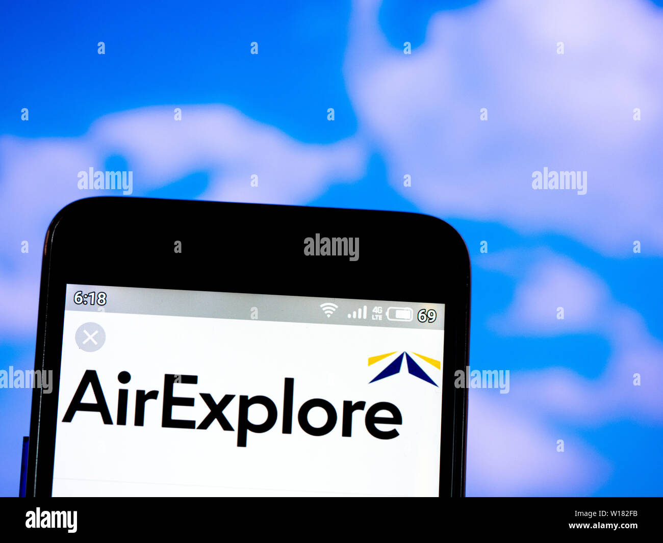 In this photo illustration the AirExplore logo is seen displayed on a ...