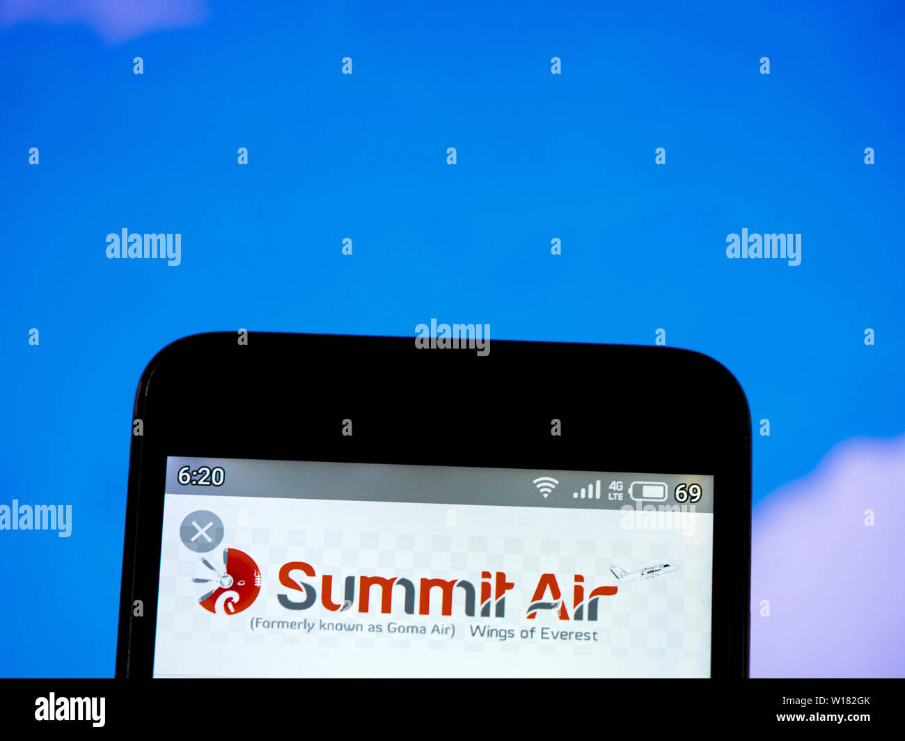 In this photo illustration the Summit Air logo is seen displayed on a ...