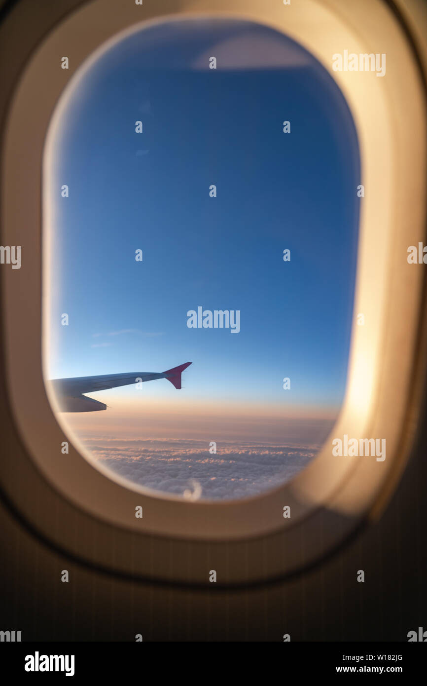 The window of the airplane. A view of porthole window on board an ...